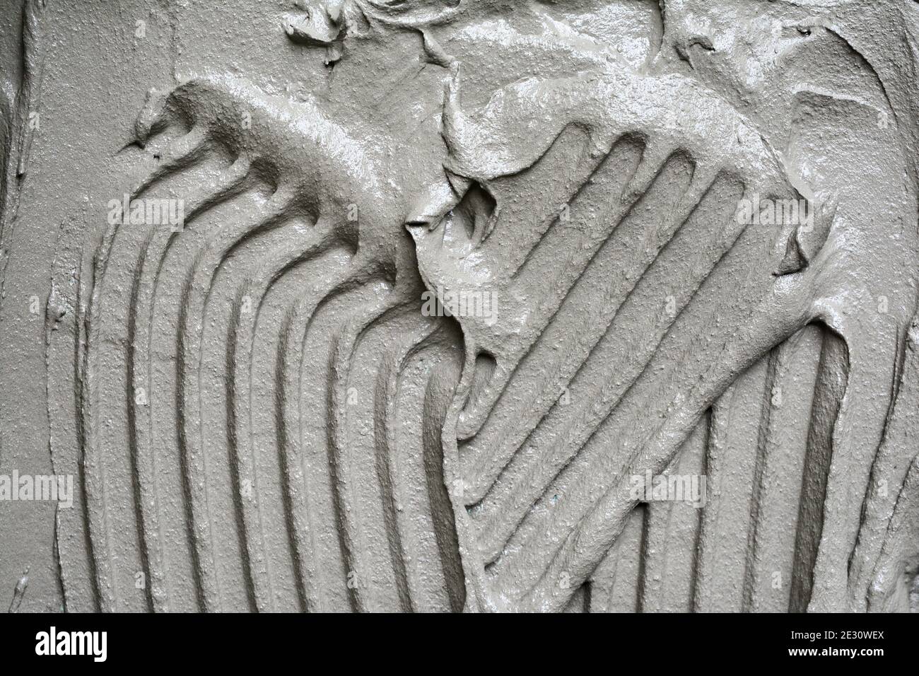 Fresh concrete tehture. Wet mortar surface. Lined grey concrete as ...