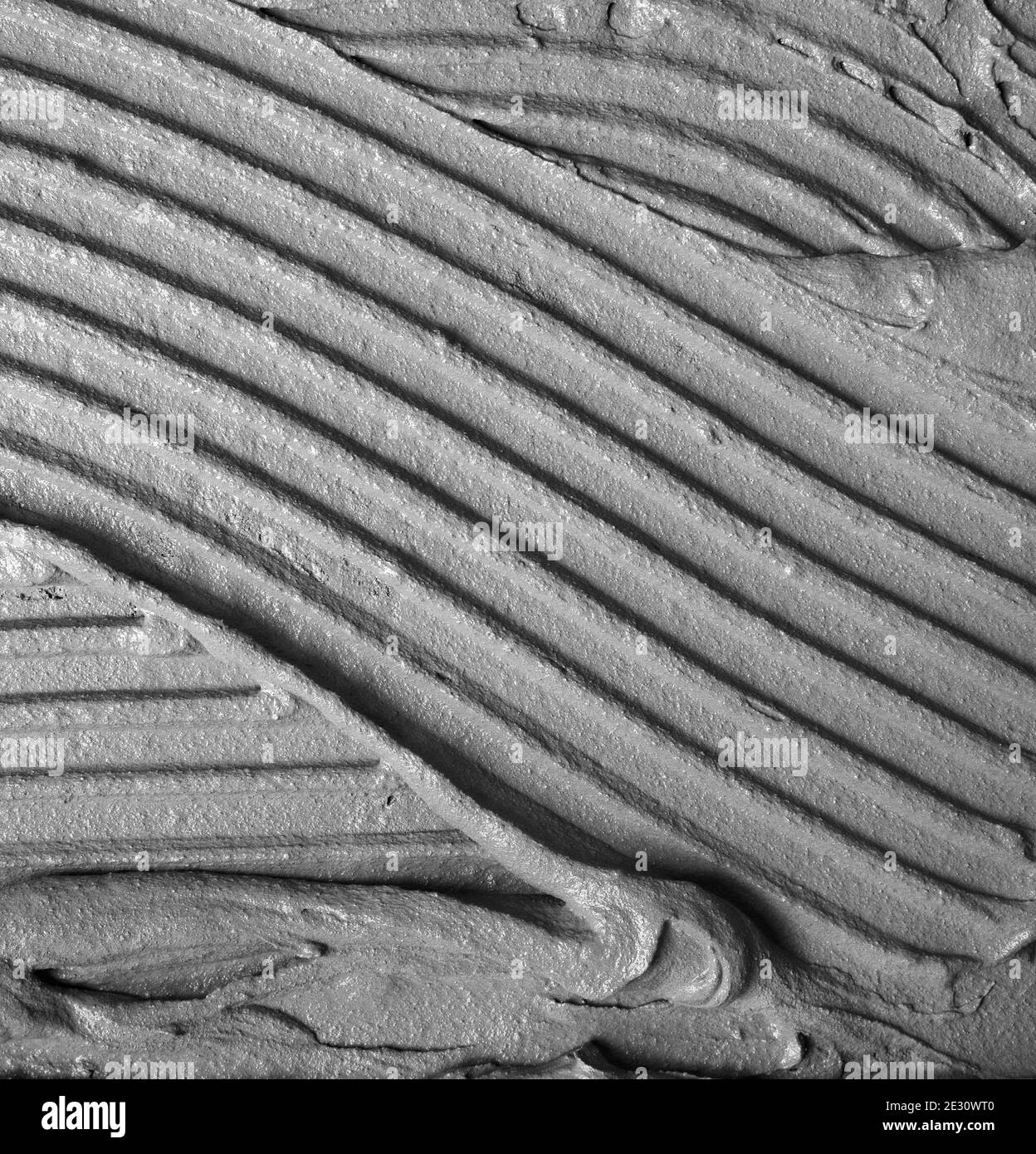 Fresh concrete tehture. Wet mortar surface. Lined grey concrete as ...