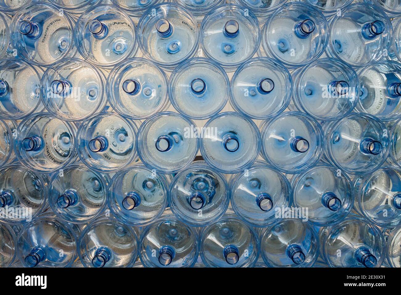 Stack of bottom Of plastic bottles Stock Photo - Alamy