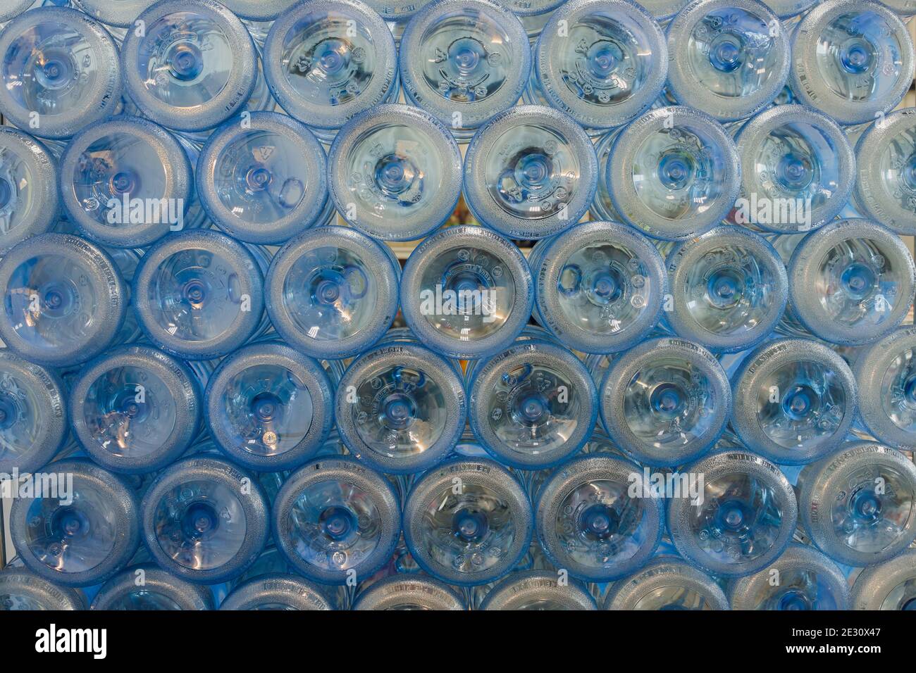 Stack of bottom Of plastic bottles Stock Photo - Alamy