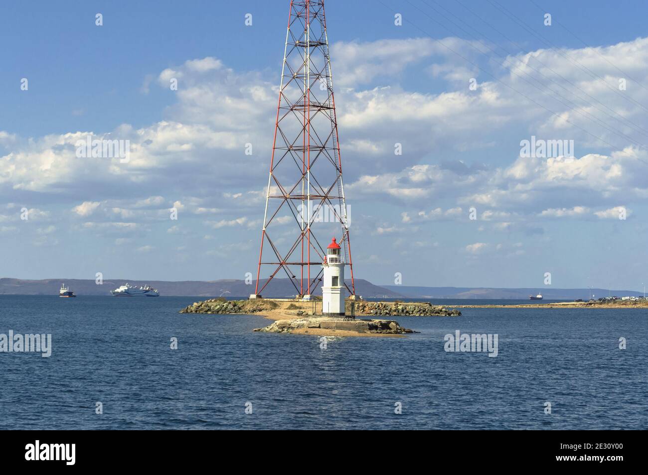 Lighthouse Tokarevskaya cat with power line view and sailing ships on ...