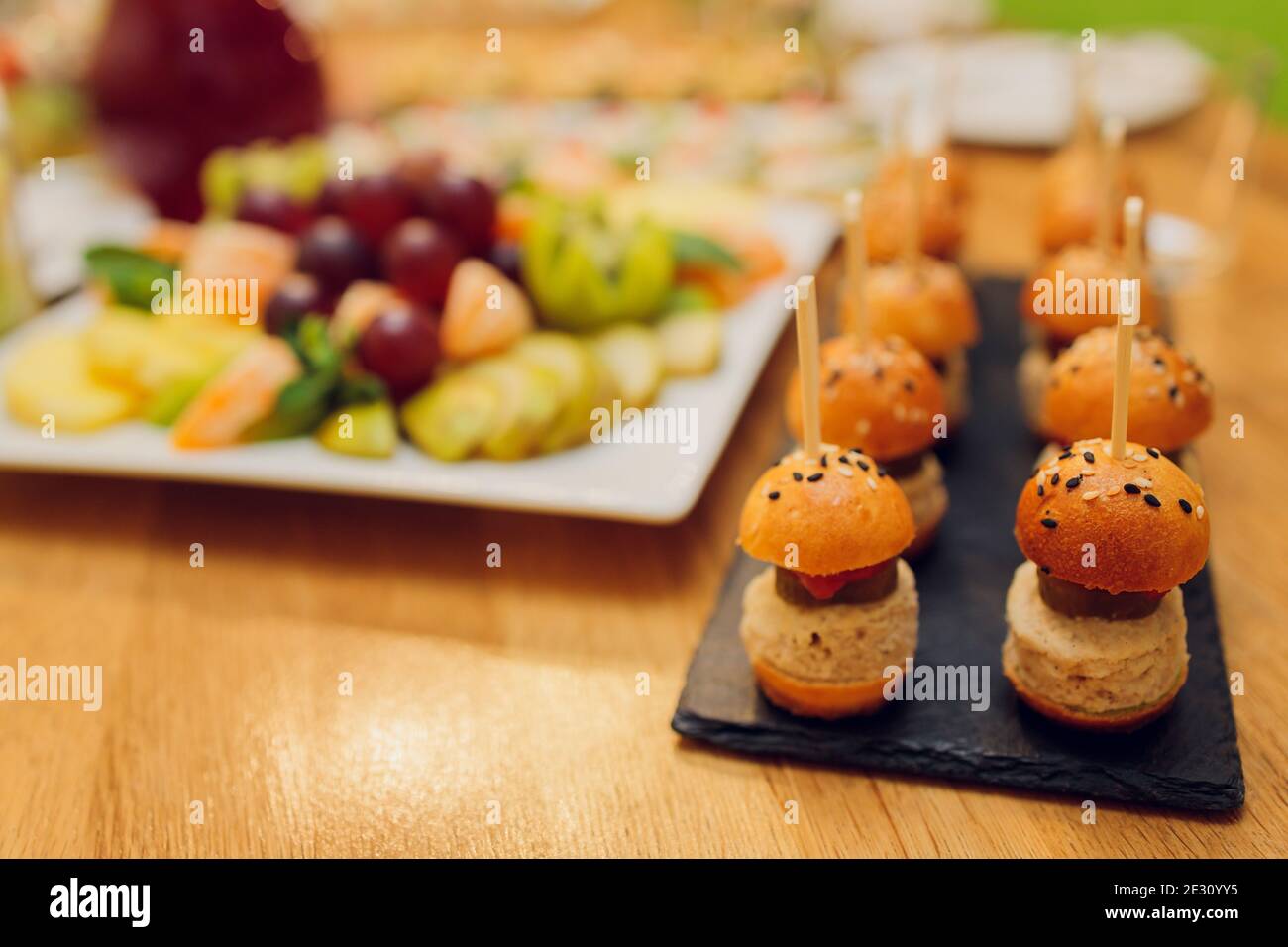 catering services background with snacks on guests table in restaurant ...