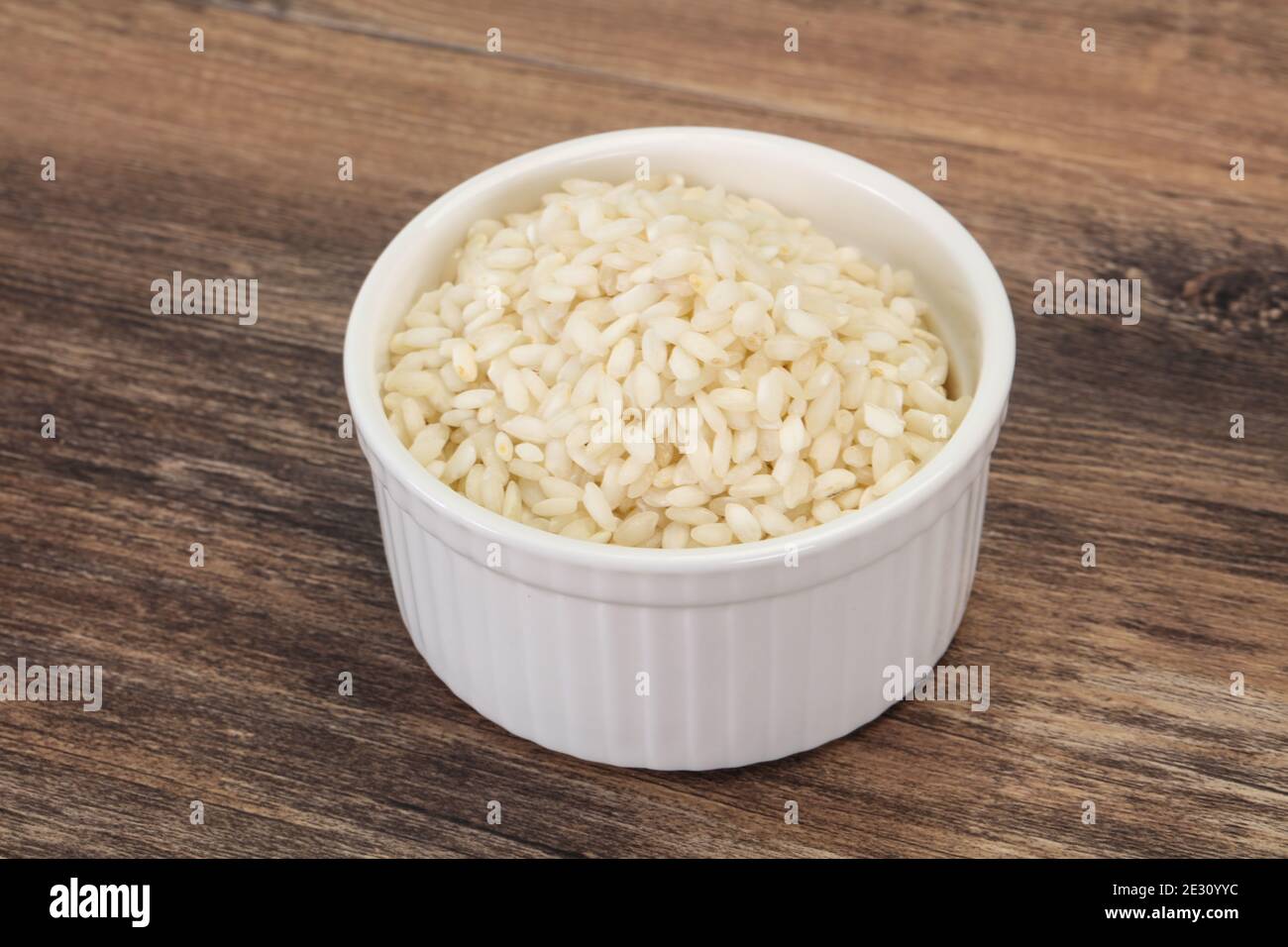 Raw Arborio rice for Italian risotto Stock Photo - Alamy