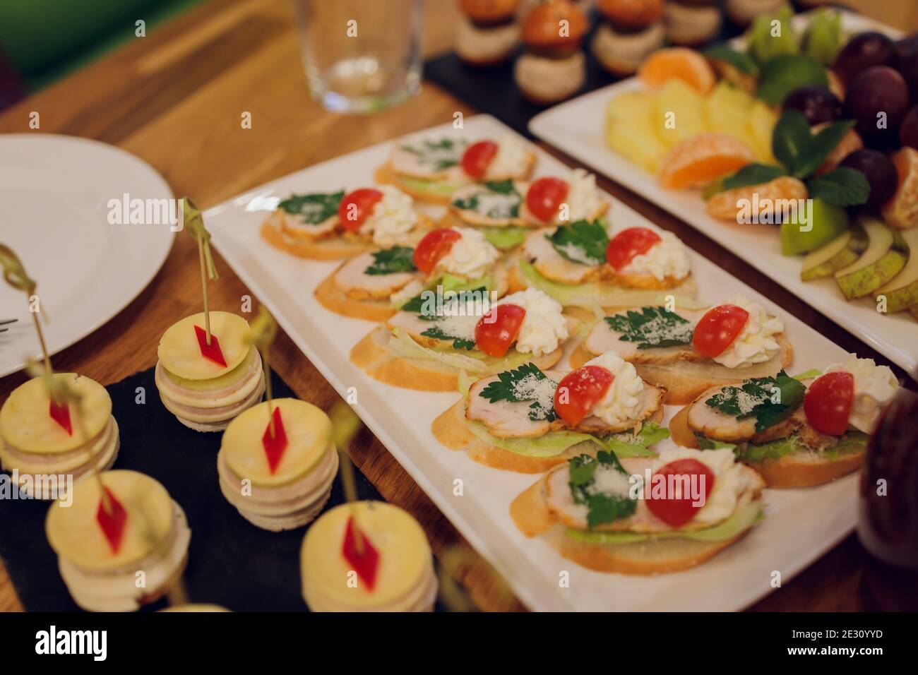catering services background with snacks on guests table in restaurant ...