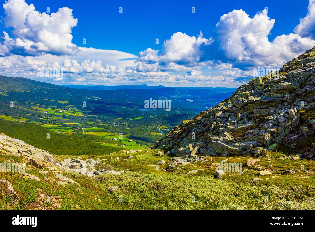 Amazing norwegian landscape with Boulders at the summit on the mountain ...