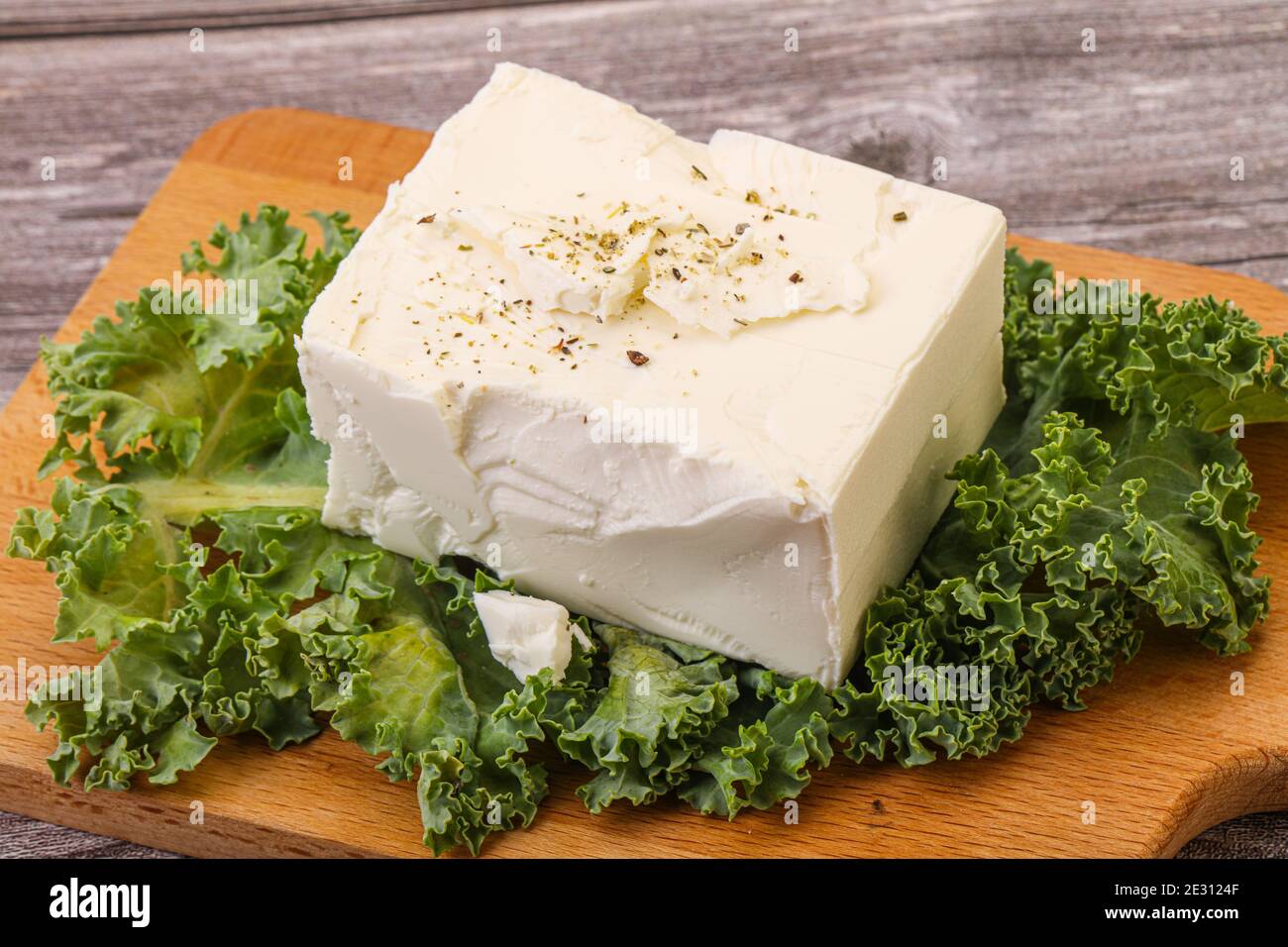 Traditional tasty Greek Feta soft cheese brick Stock Photo - Alamy