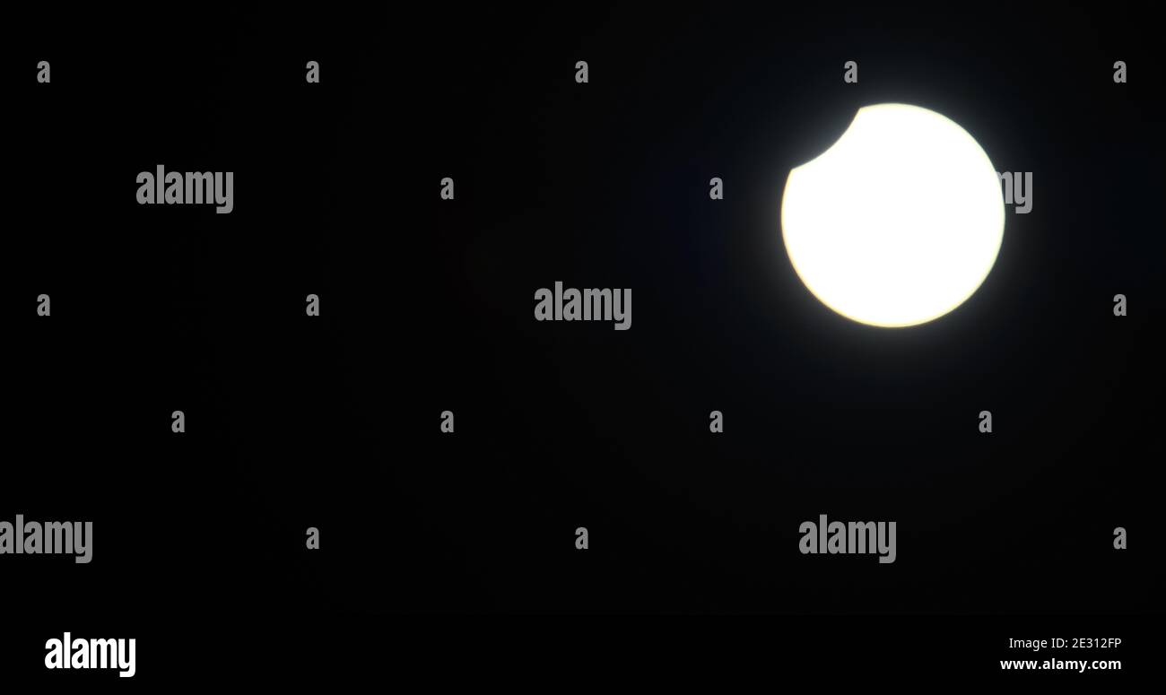 super bright white solar eclipse panorama Stock Photo - Alamy