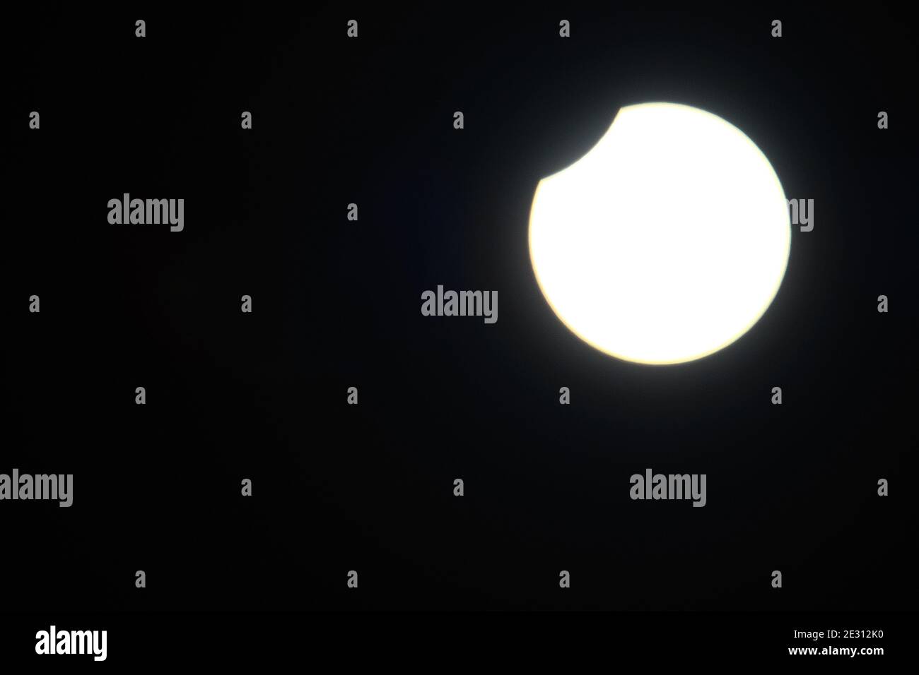 very bright white solar eclipse Stock Photo - Alamy