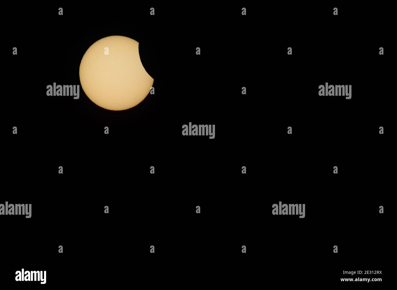 beautiful partial eclipse of the moon occurs with left Stock Photo - Alamy