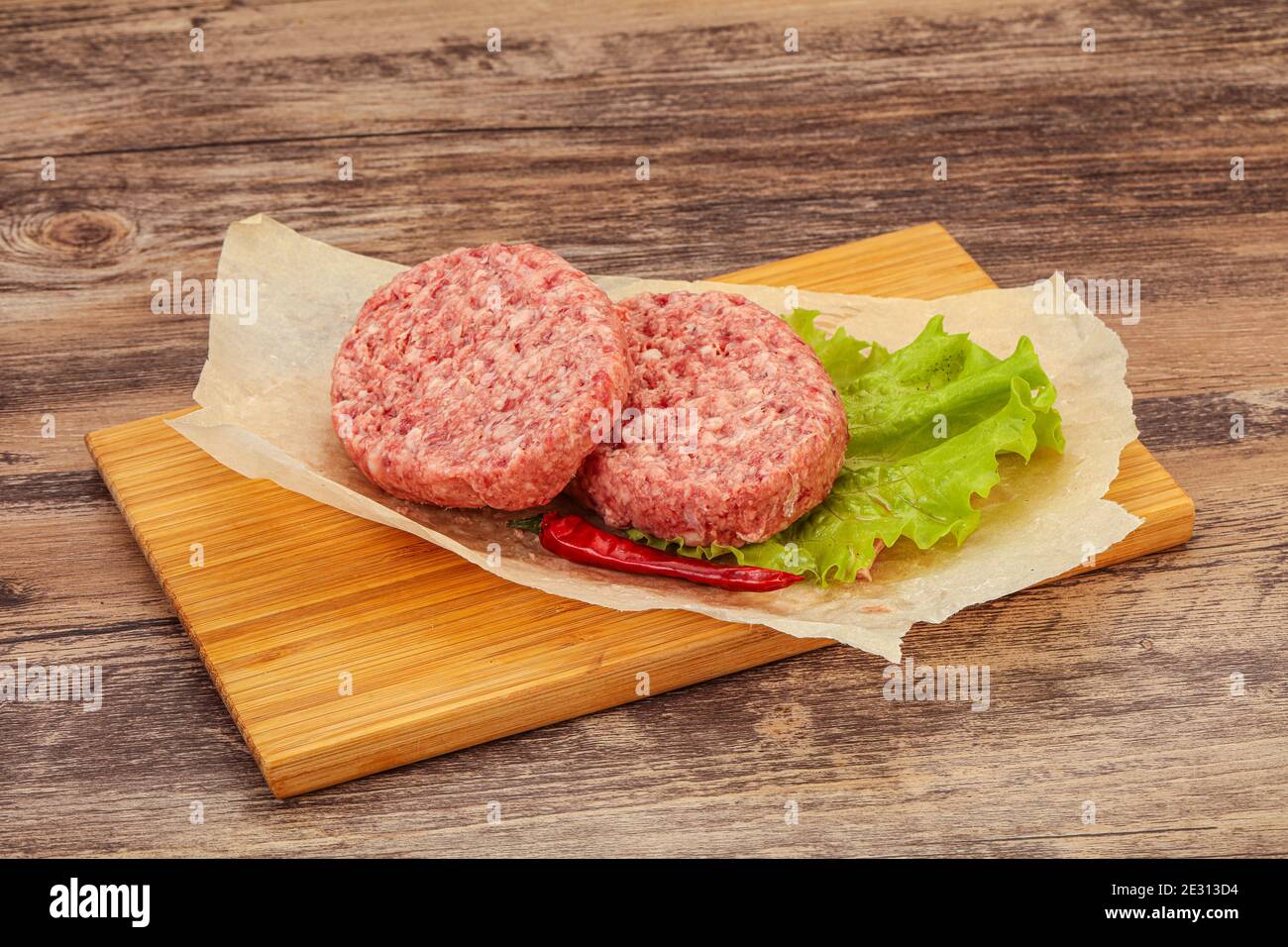 Raw beef meat cutlet for burger Stock Photo - Alamy