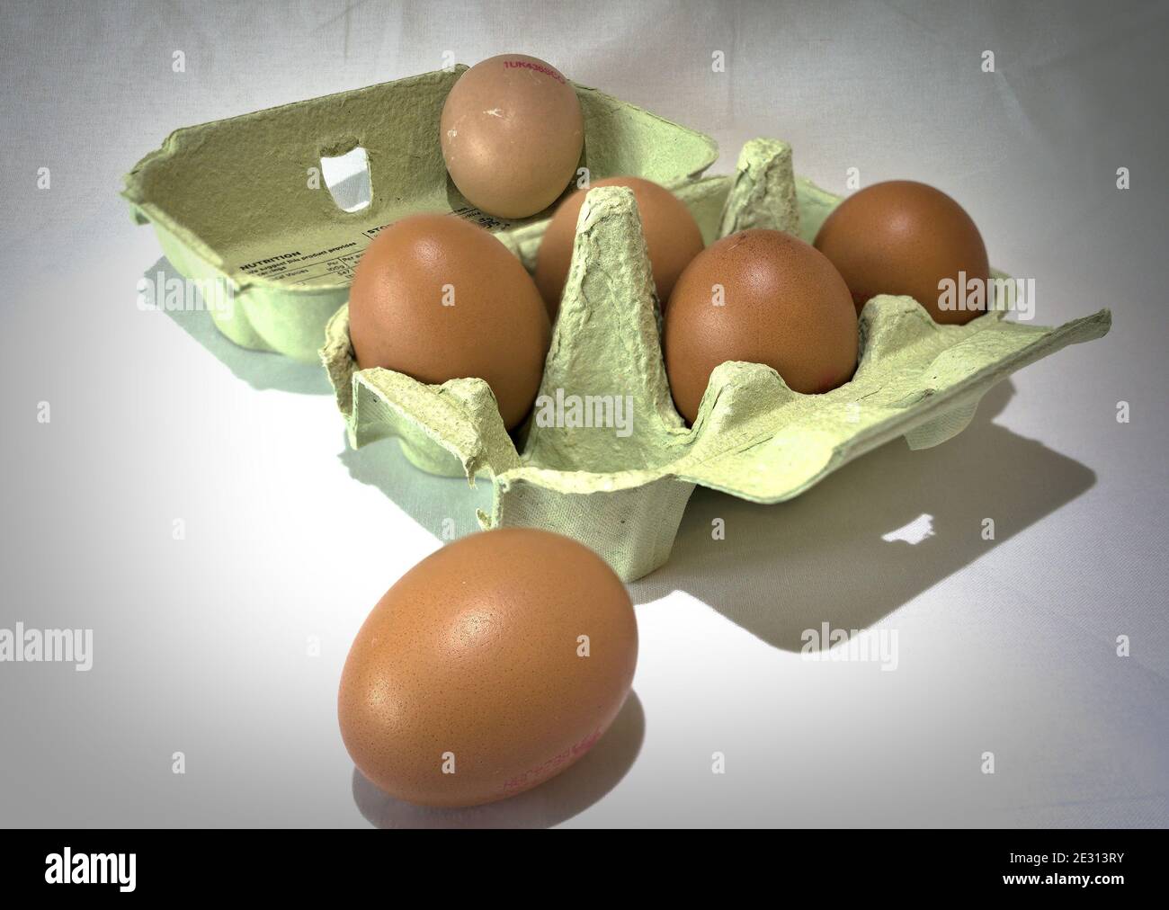 Eggs in an egg box Stock Photo - Alamy