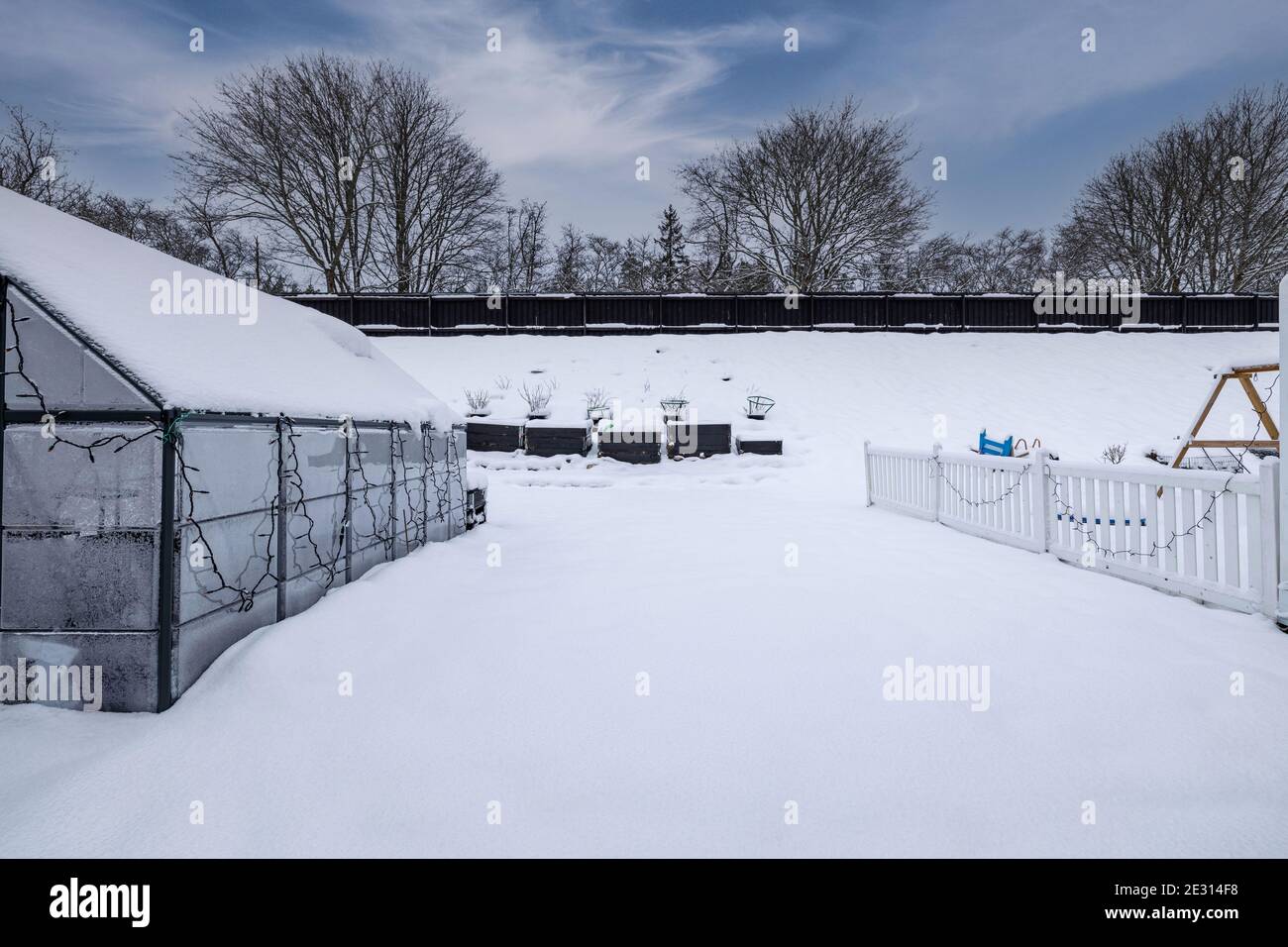 Gorgeous winter view of exterior of a private small garden Landscape ...