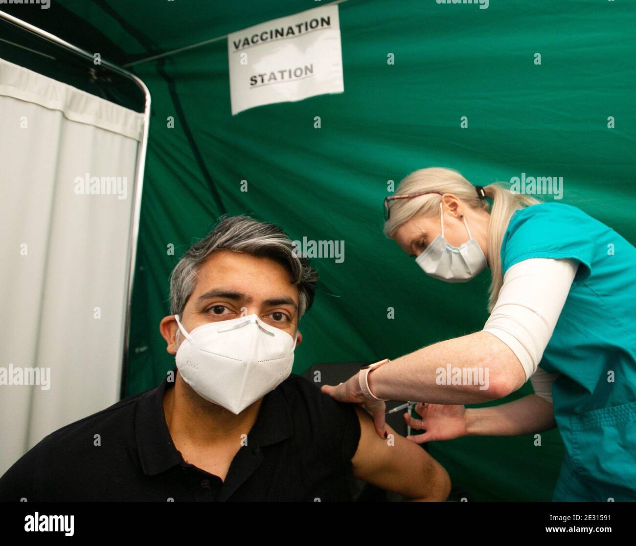 GP Mary Behan administering the Moderna vaccine against COVID-19 to GP ...