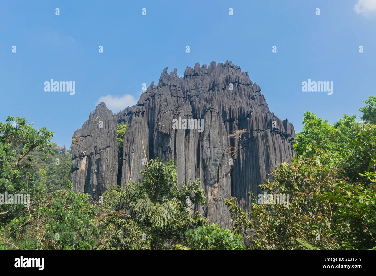 Panoramic view of massive and unusual karst rock formation or outcrop ...