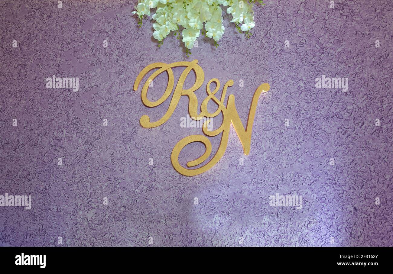 Yellow letters R and N. Pink Backgrounds Stock Photo - Alamy