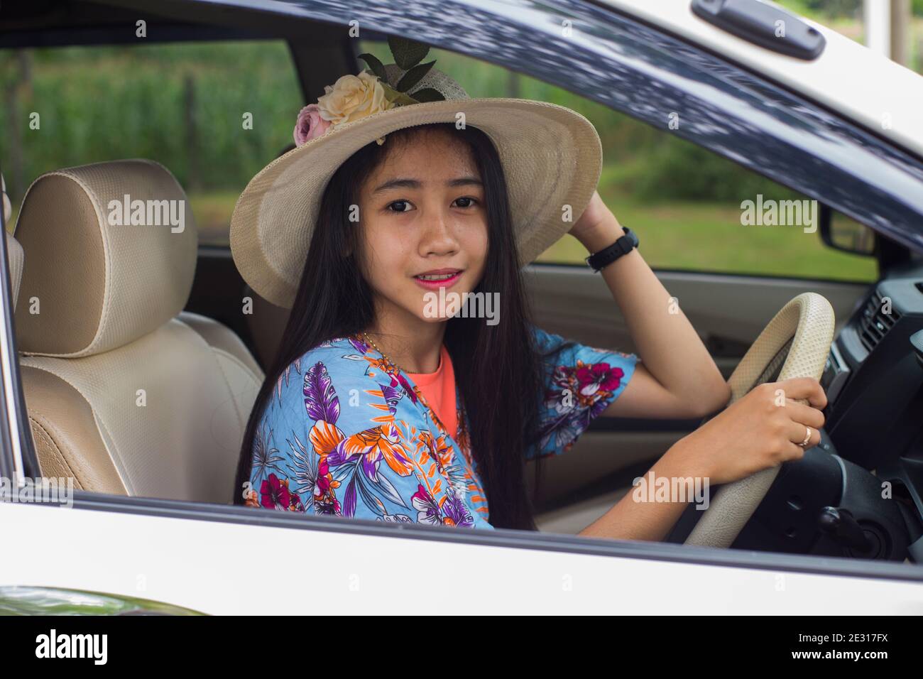 portrait of young asian beauty woman driving a car Stock Photo - Alamy