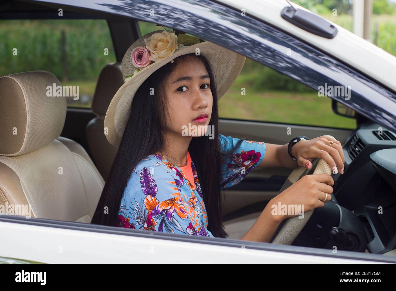 portrait of young asian beauty woman driving a car Stock Photo - Alamy