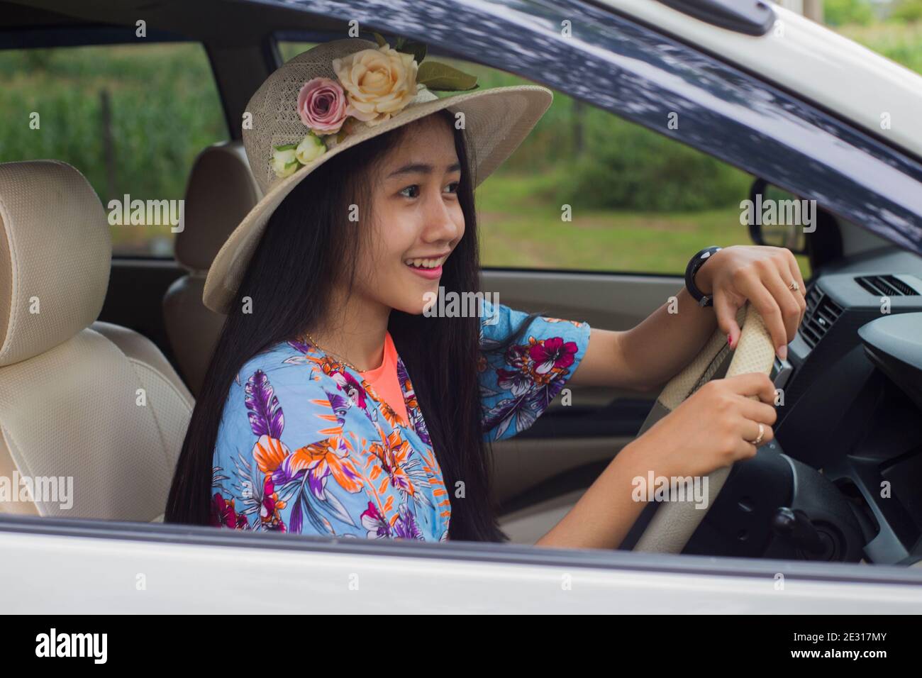 portrait of young asian beauty woman driving a car Stock Photo - Alamy