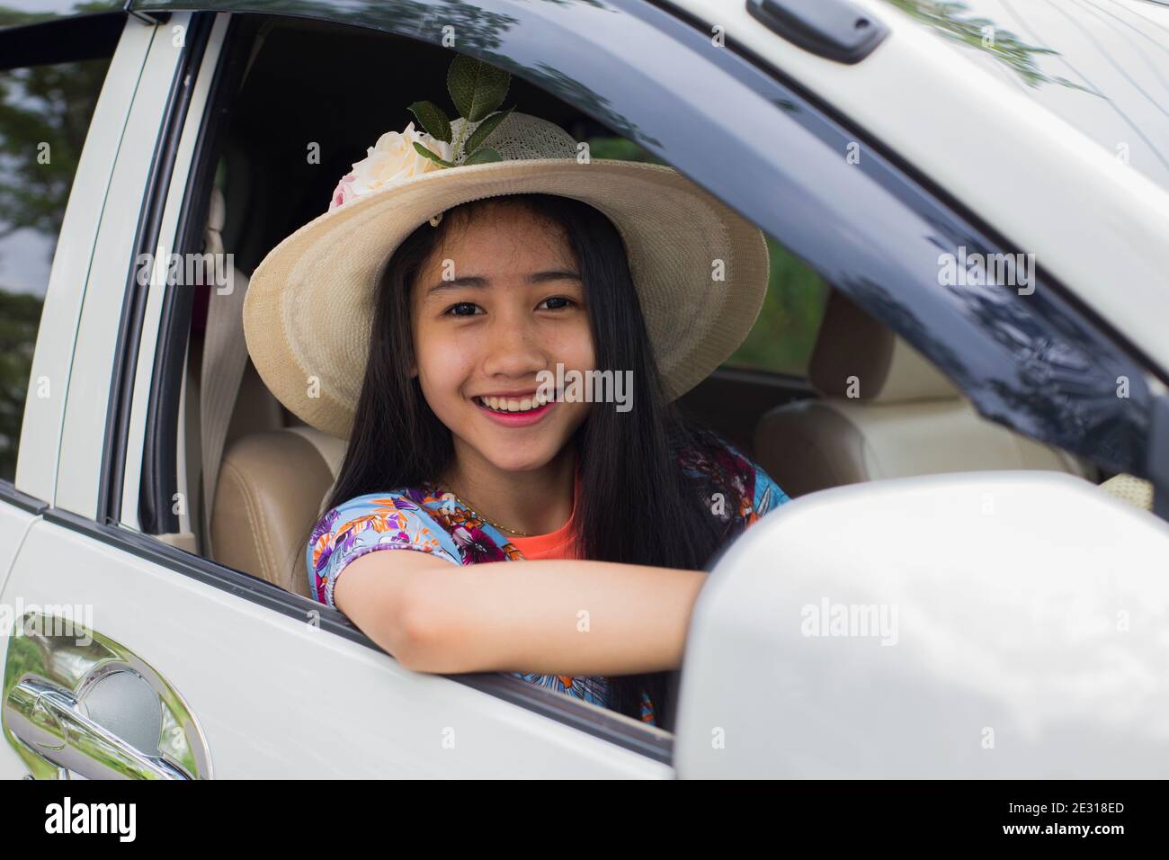 portrait of young asian beauty woman driving a car Stock Photo - Alamy