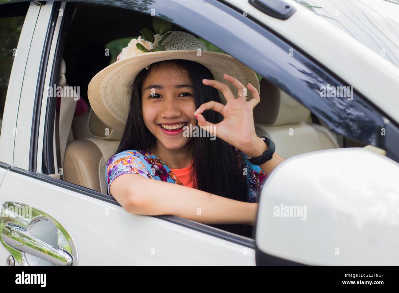 portrait of young asian beauty woman driving a car Stock Photo - Alamy