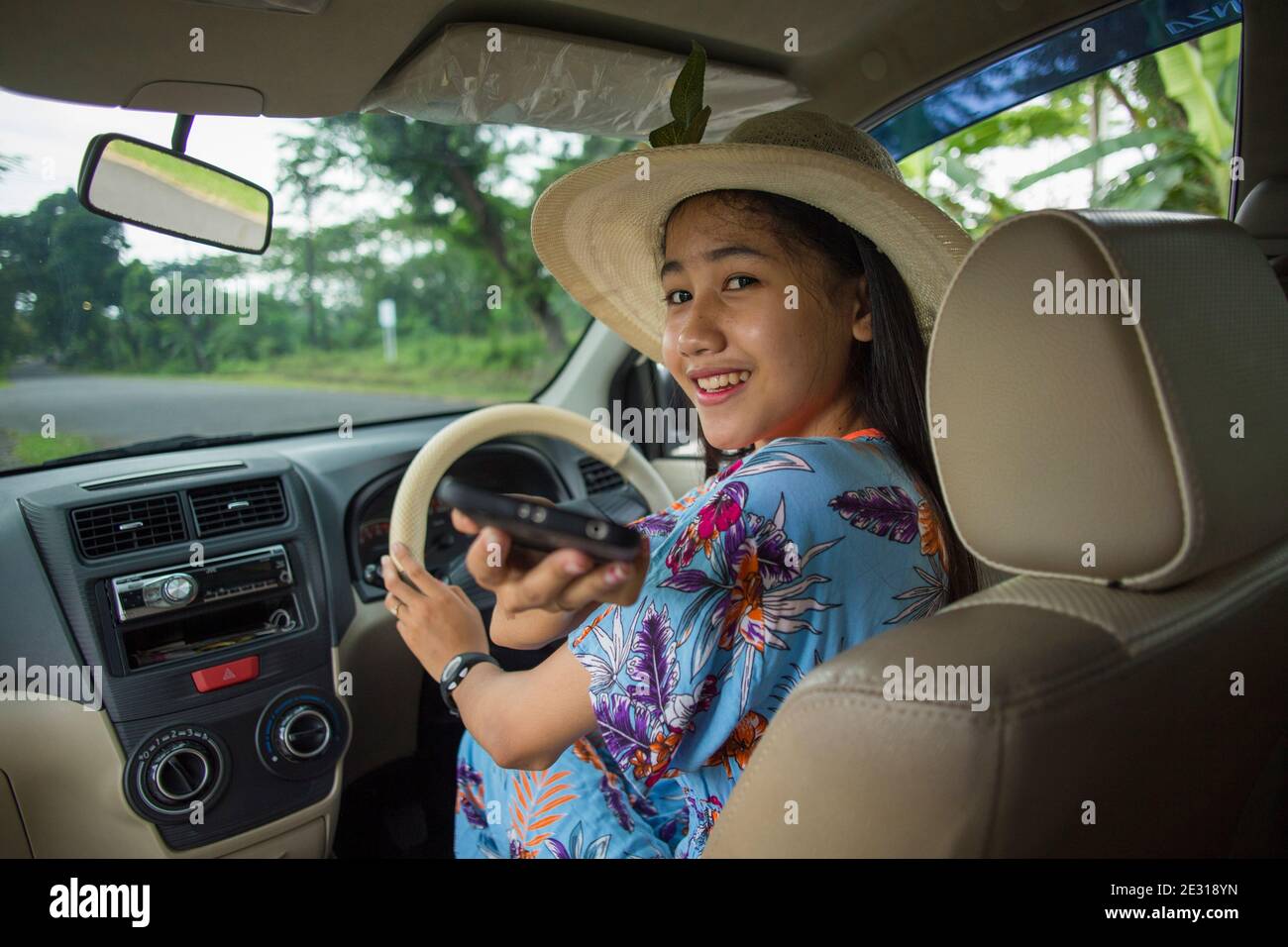 portrait of young asian beauty woman driving a car Stock Photo - Alamy