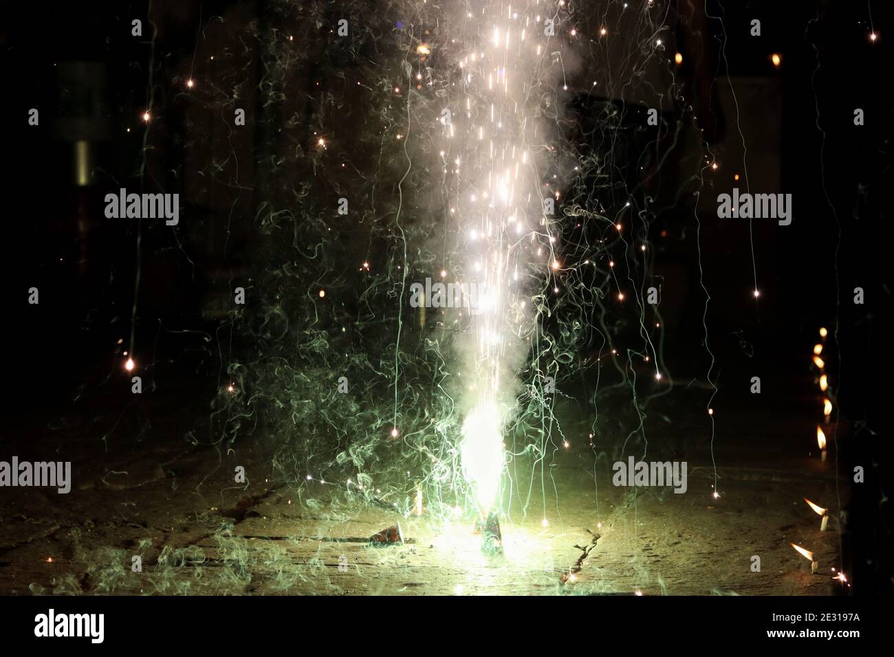 View of fountain fireworks stream isolated on dark background with ...