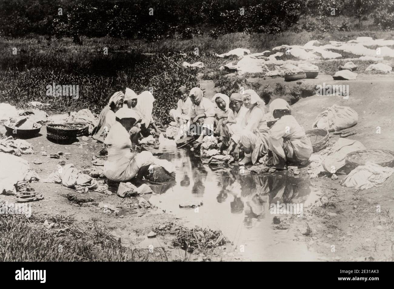 Washing clothes in a river hi-res stock photography and images - Alamy
