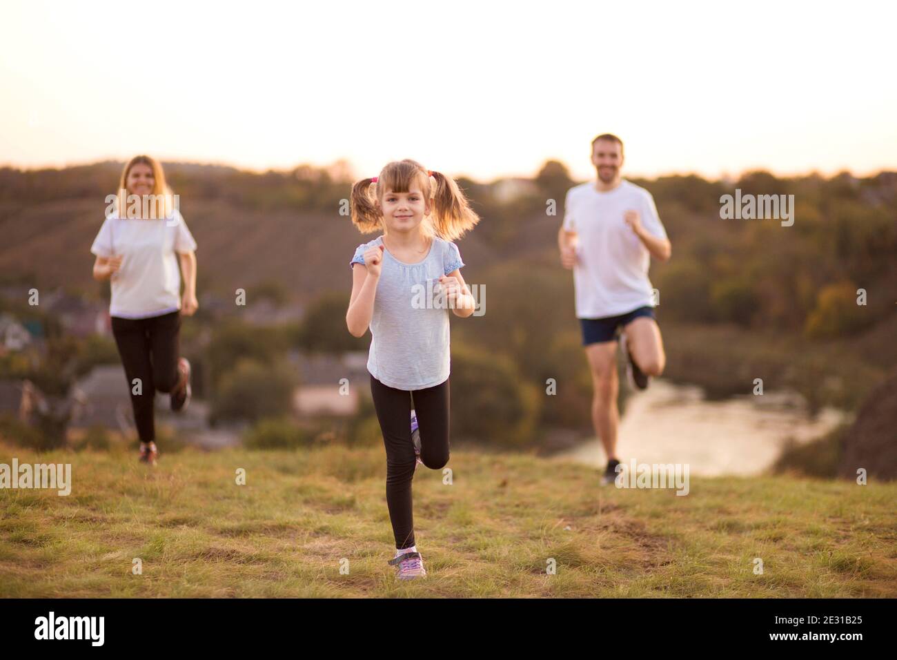 Child exercise jogging hi-res stock photography and images - Alamy