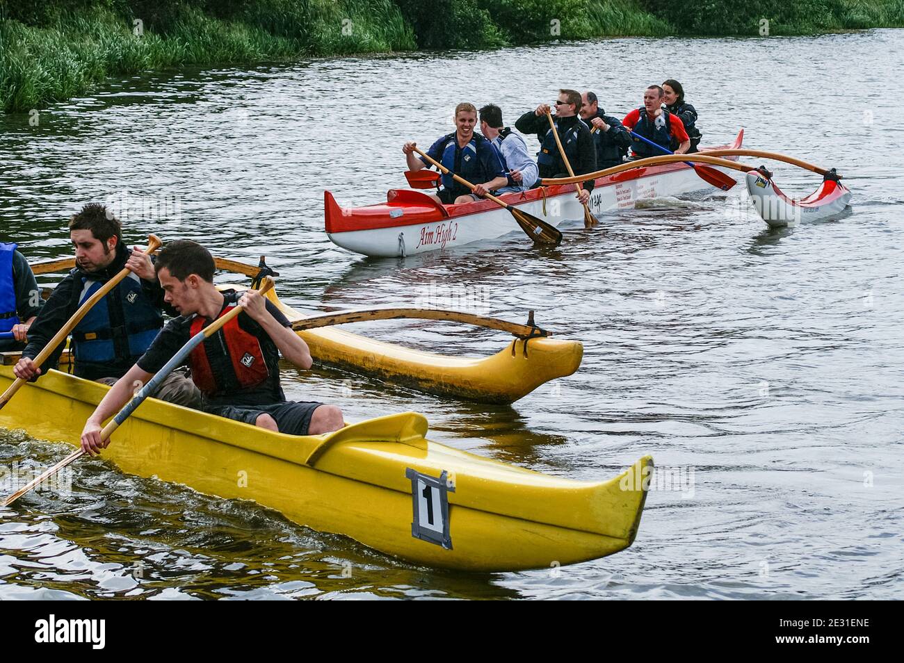 People paddling V6 Hawaiian outrigger canoes (known as va'a), UK Stock ...