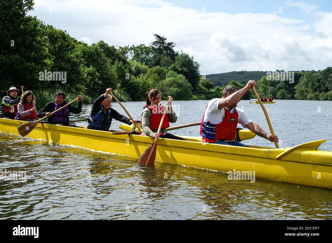 People paddling V6 Hawaiian outrigger canoes (known as va'a), UK Stock ...