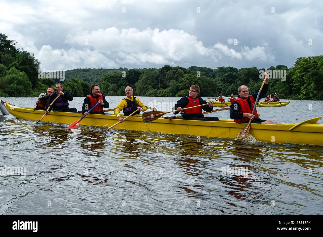 People paddling V6 Hawaiian outrigger canoes (known as va'a), UK Stock ...