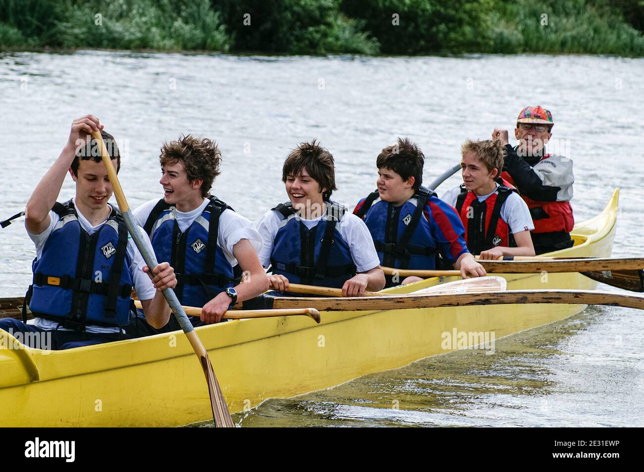 People paddling V6 Hawaiian outrigger canoes (known as va'a), UK Stock ...