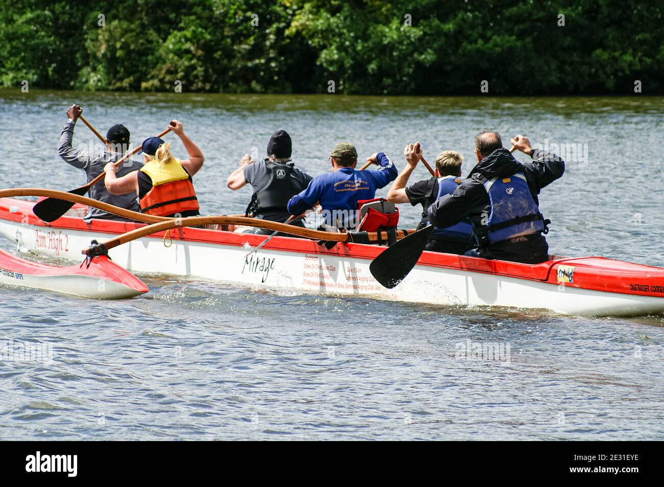 People paddling V6 Hawaiian outrigger canoes (known as va'a), UK Stock ...