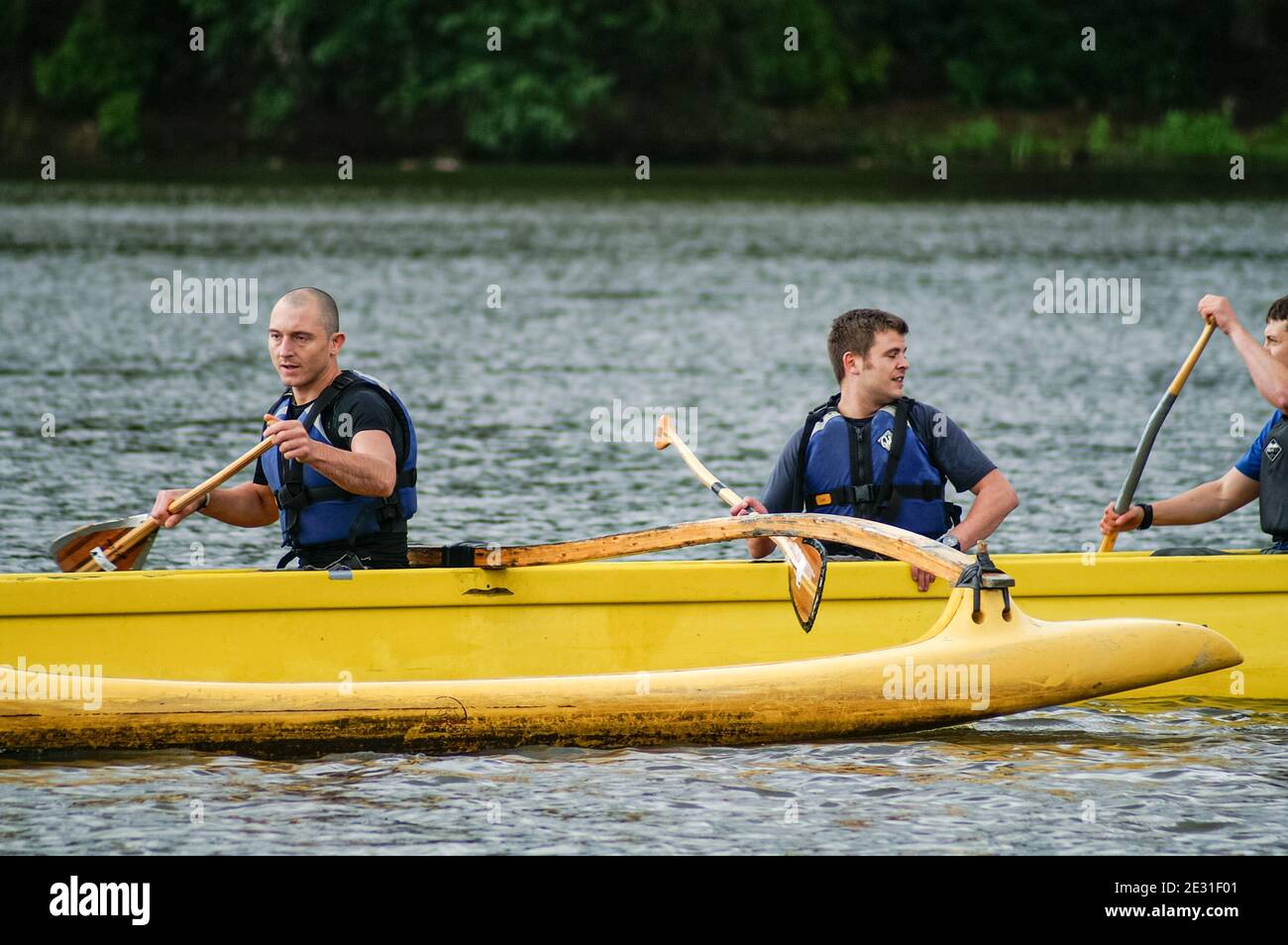 People paddling V6 Hawaiian outrigger canoes (known as va'a), UK Stock ...