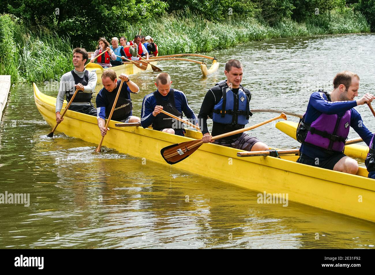 People paddling V6 Hawaiian outrigger canoes (known as va'a), UK Stock ...