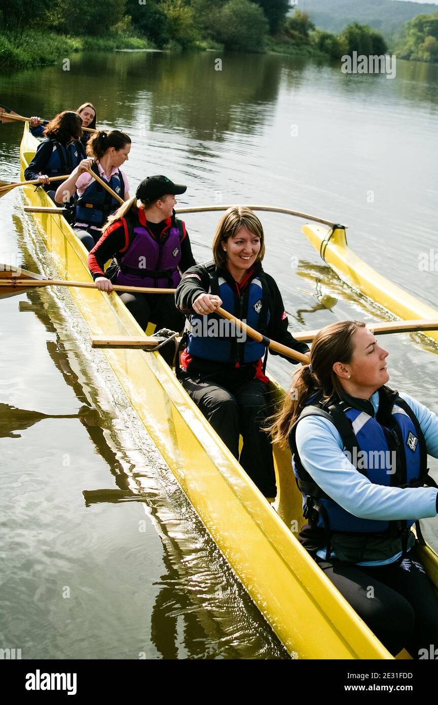 People paddling V6 Hawaiian outrigger canoes (known as va'a), UK Stock ...