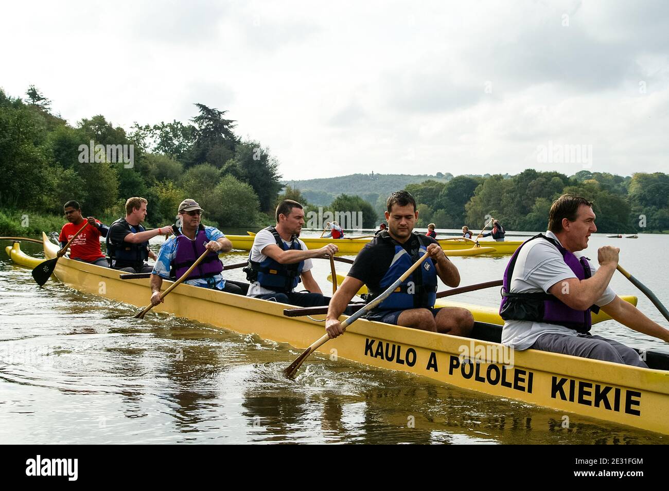 People paddling V6 Hawaiian outrigger canoes (known as va'a), UK Stock ...