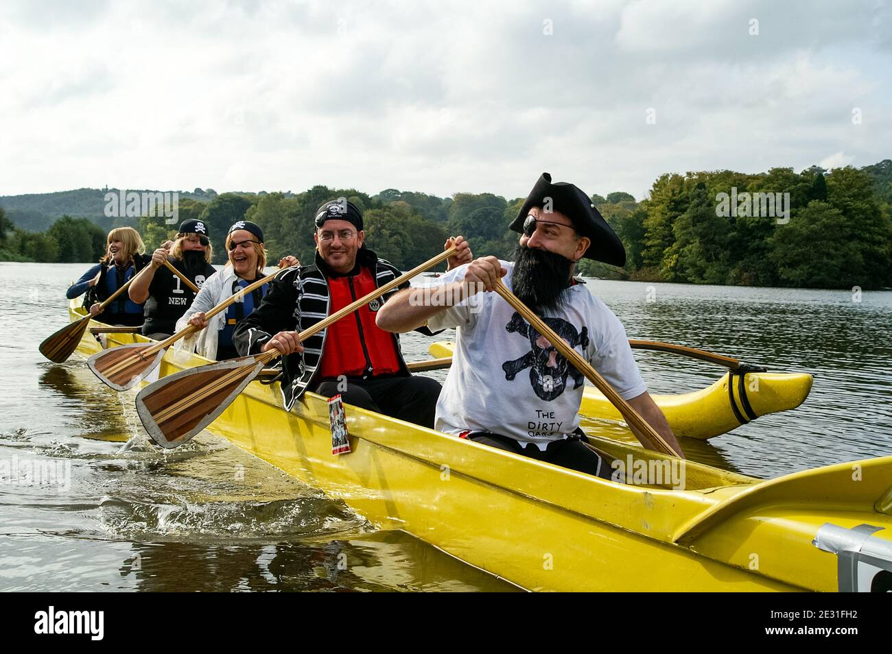 People having fun paddling V6 Hawaiian outrigger canoes (known as va'a ...