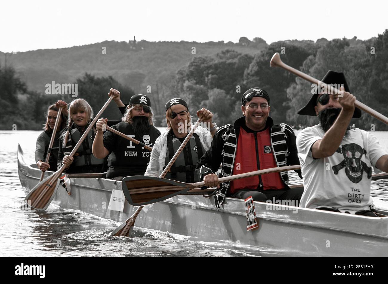 People having fun paddling V6 Hawaiian outrigger canoes (known as va'a ...