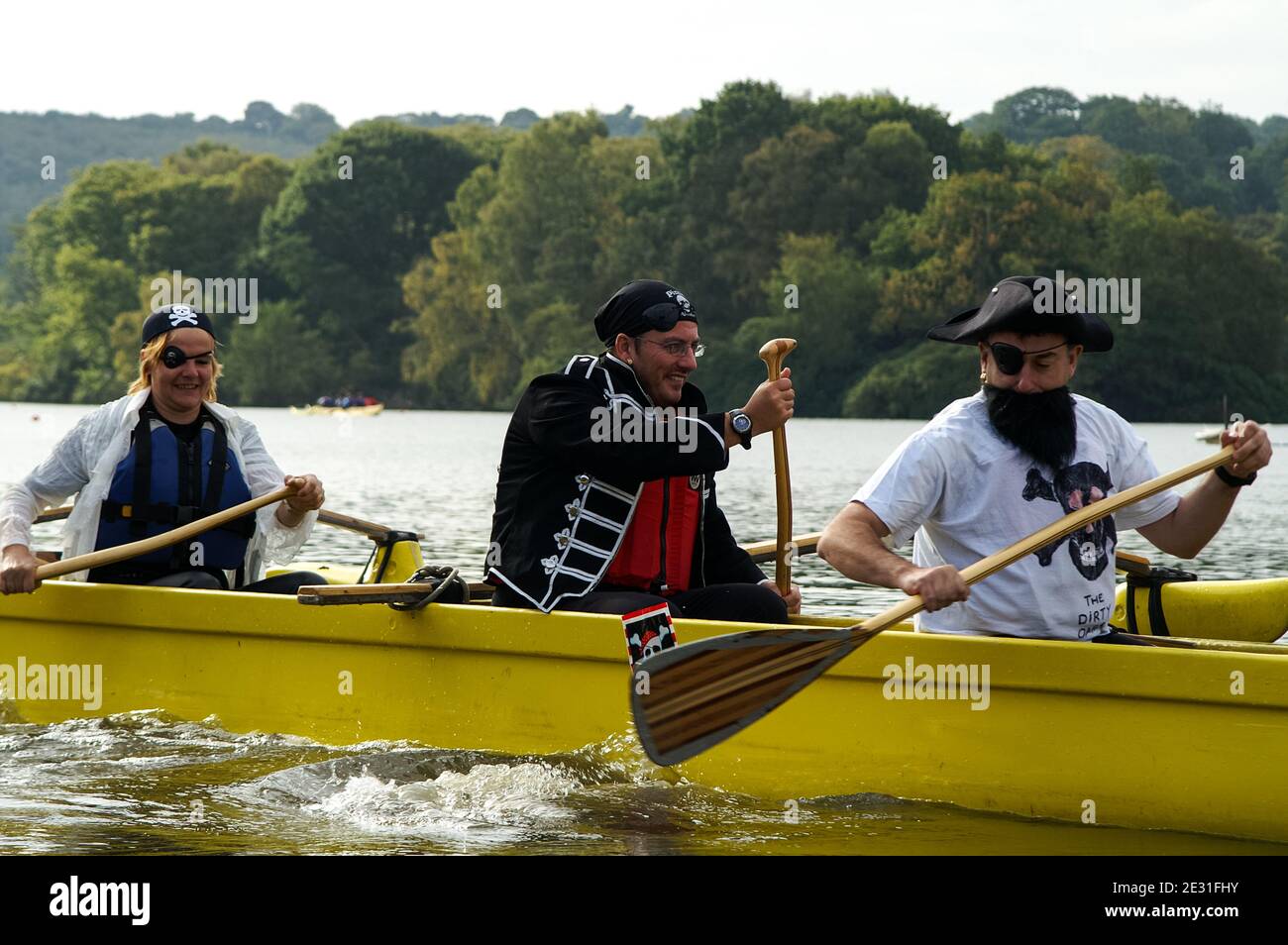 People having fun paddling V6 Hawaiian outrigger canoes (known as va'a ...