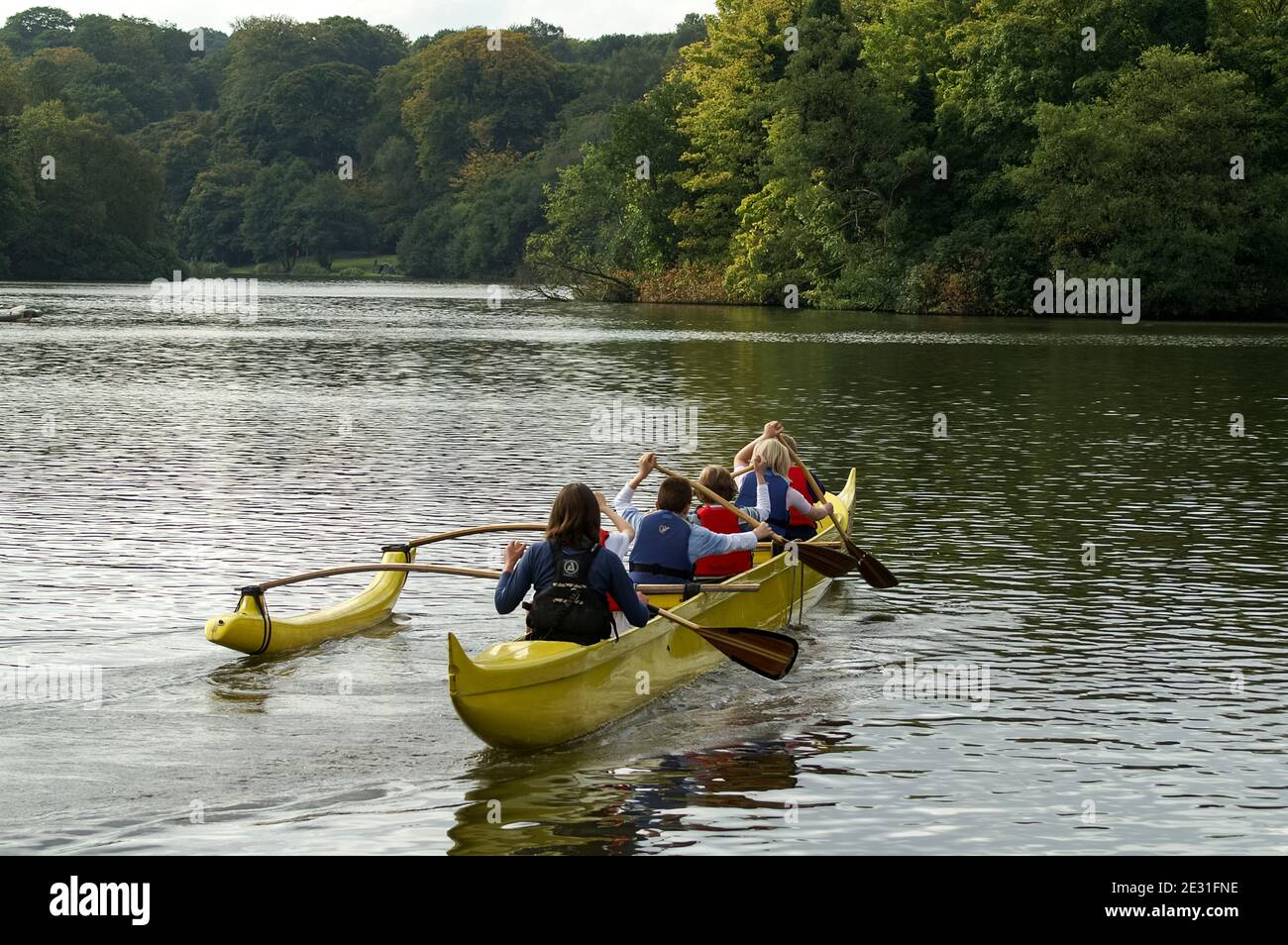 People paddling V6 Hawaiian outrigger canoes (known as va'a), UK Stock ...