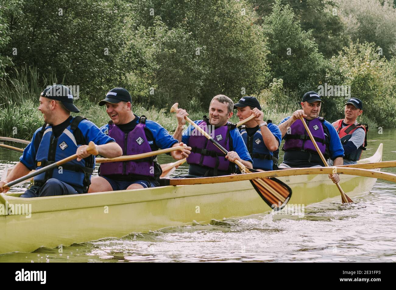 People paddling V6 Hawaiian outrigger canoes (known as va'a), UK Stock ...