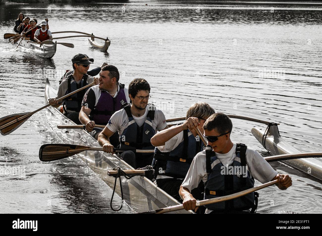 People paddling V6 Hawaiian outrigger canoes (known as va'a), UK Stock ...