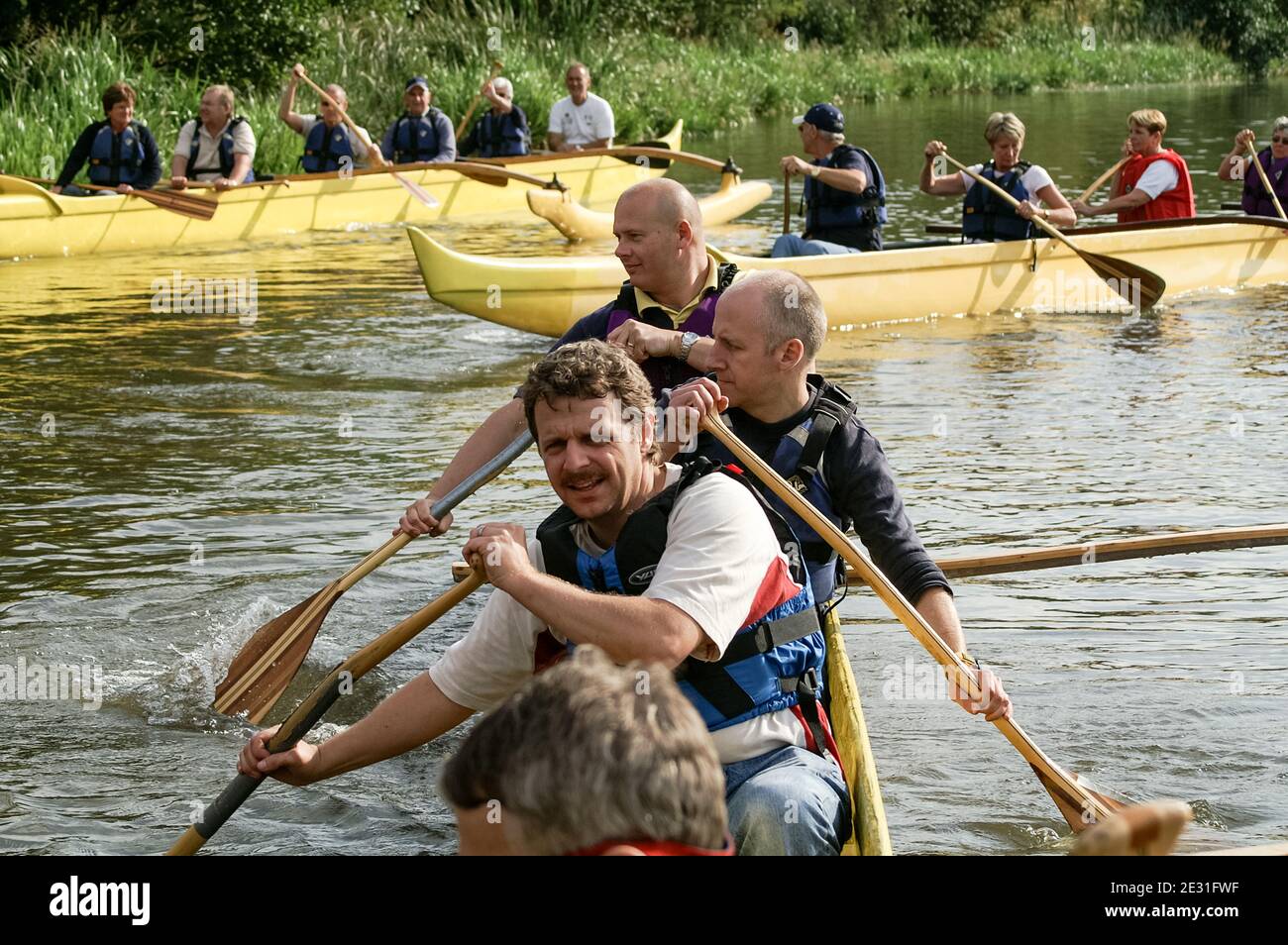 People paddling V6 Hawaiian outrigger canoes (known as va'a), UK Stock ...