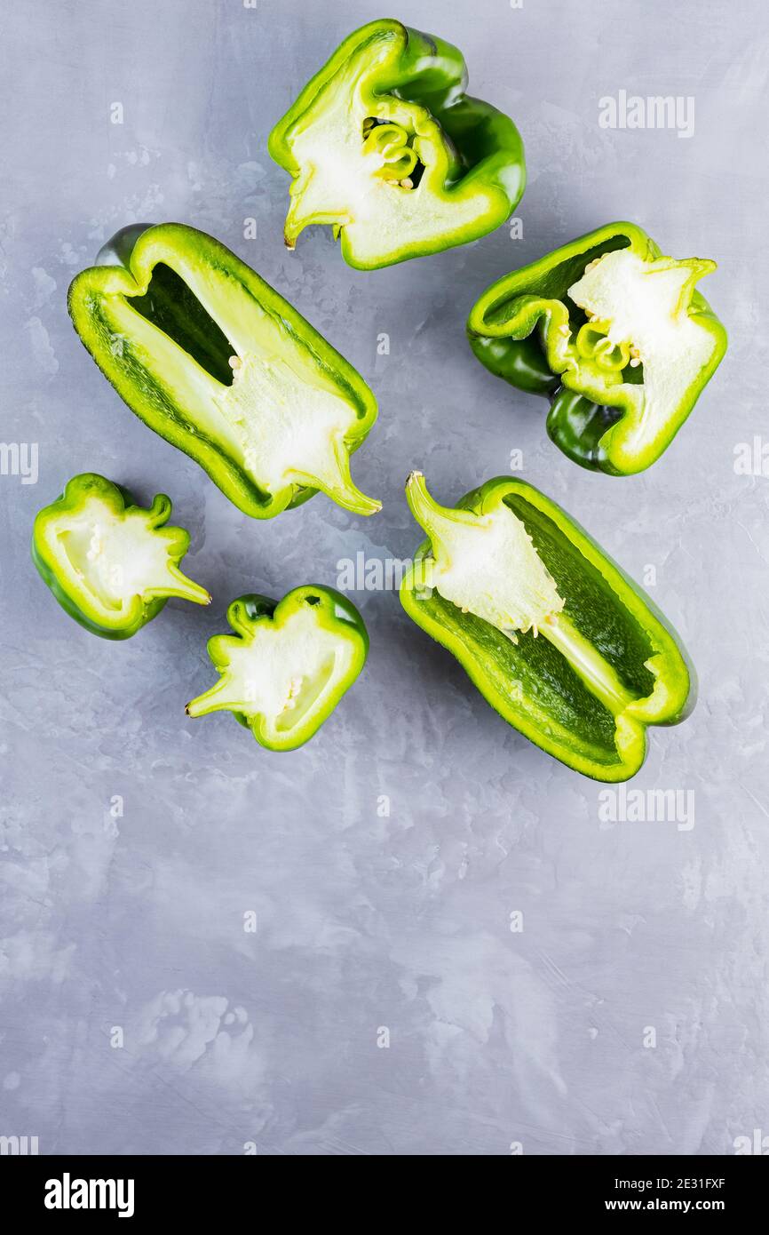 Ugly bell pepper on ultimate gray background. Sliced bell pepper halves ...
