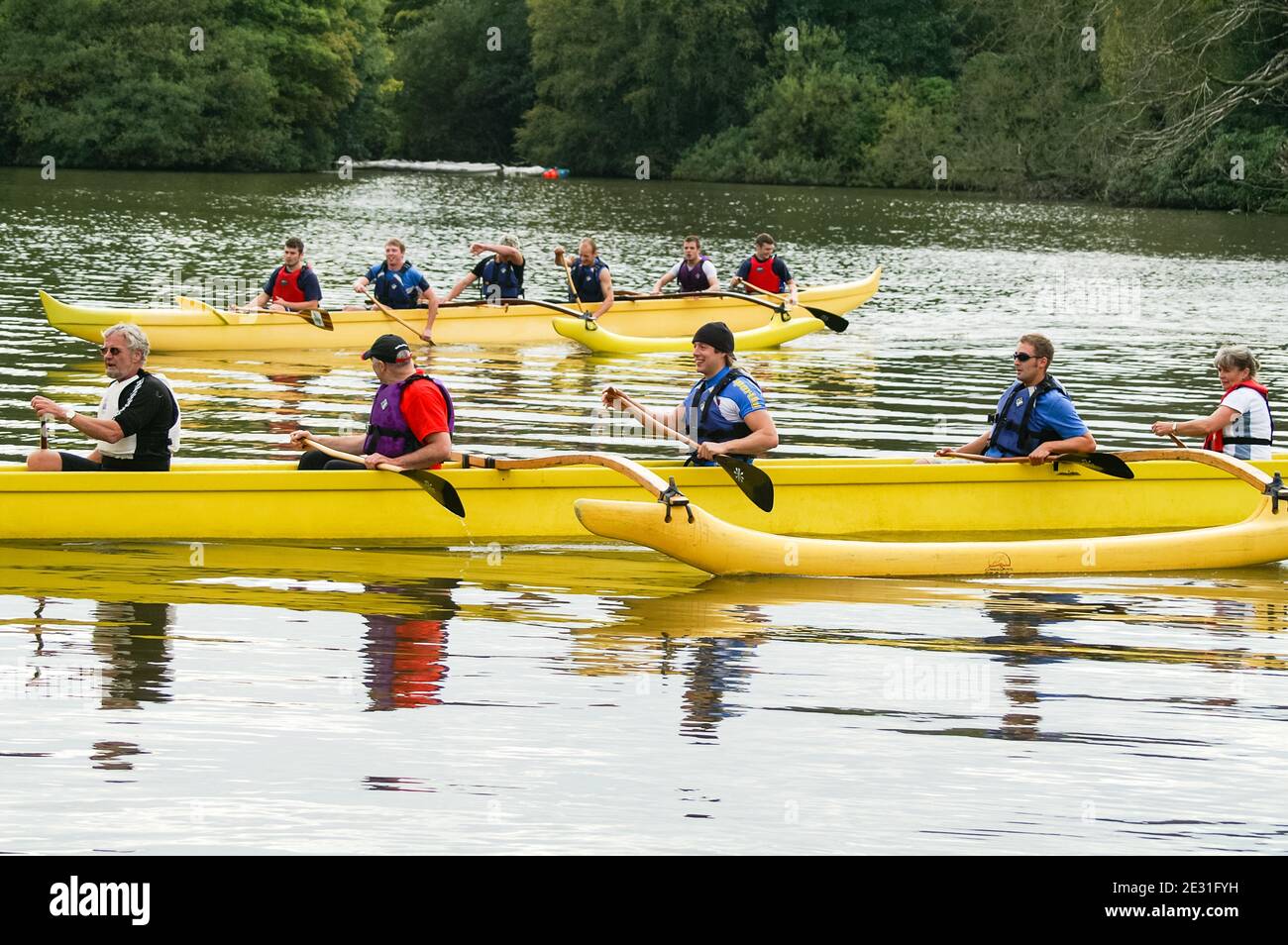 People paddling V6 Hawaiian outrigger canoes (known as va'a), UK Stock ...