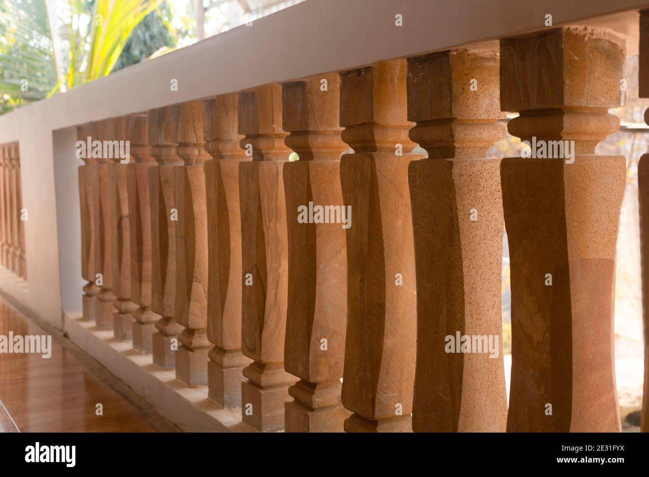 Balcony outside the apartment. Machined sandstone balcony railing ...
