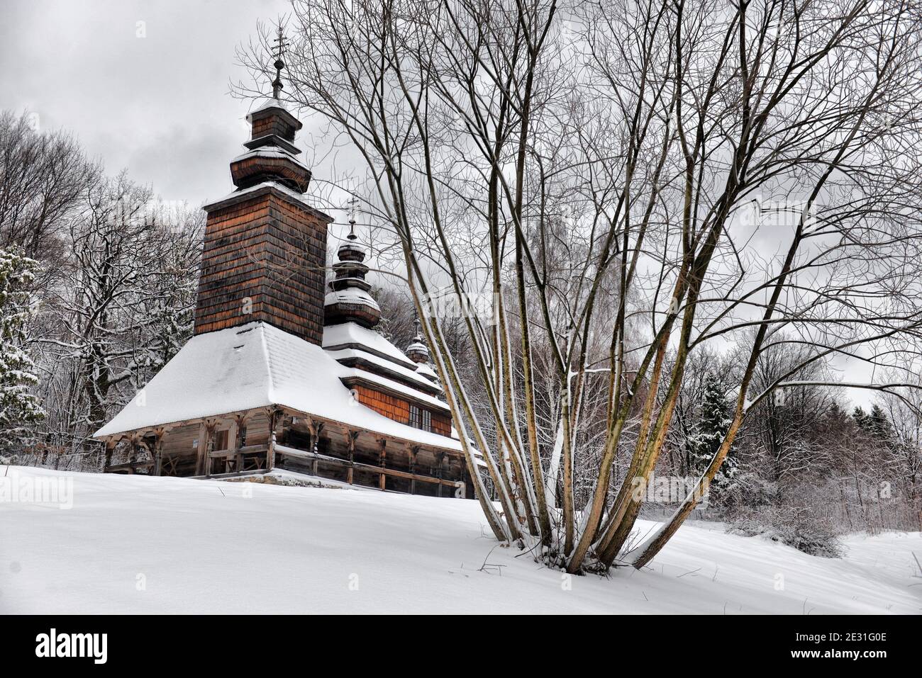 Traditional Ukrainian architecture. Old house with thatched roof and ...