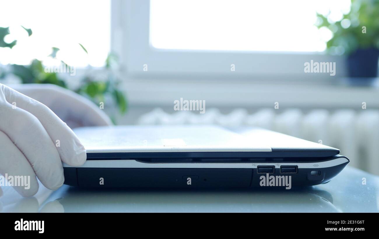 Closeup Image with Hands Wearing Protective Gloves Using the Laptop ...