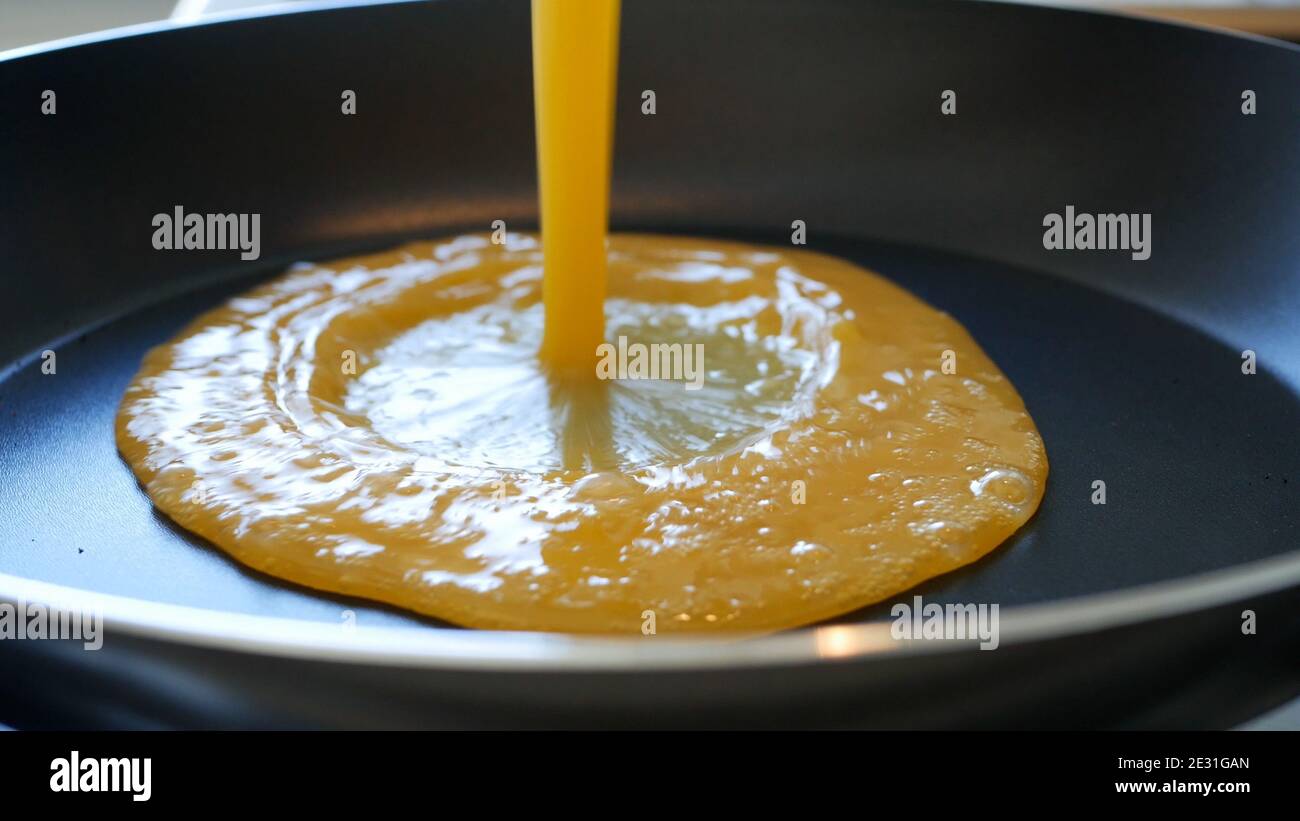 Cooker preparing omelette hi-res stock photography and images - Alamy